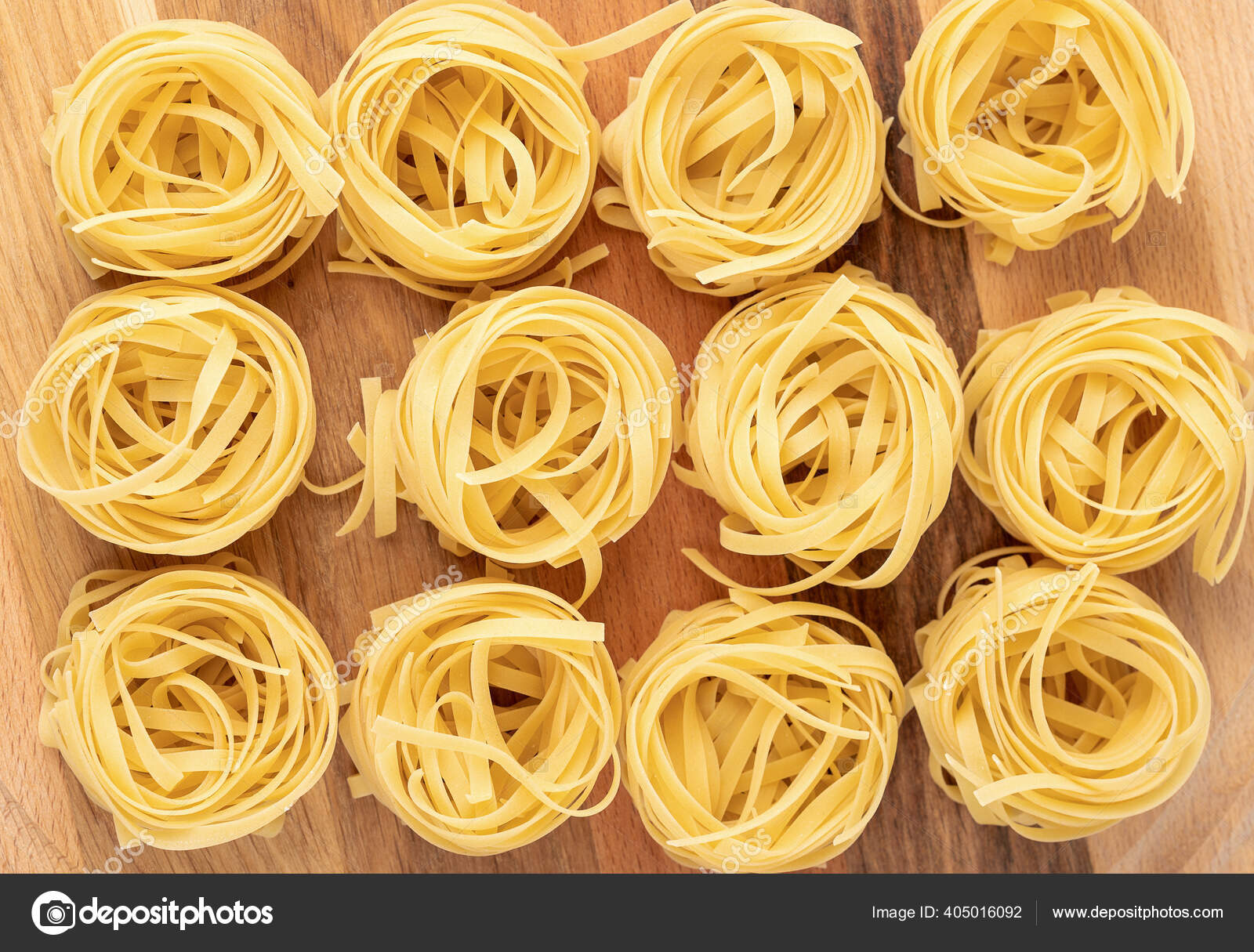 Uncooked Dry Tagliatelle Pasta Nest Wooden Board Copy Space Stock Photo ...