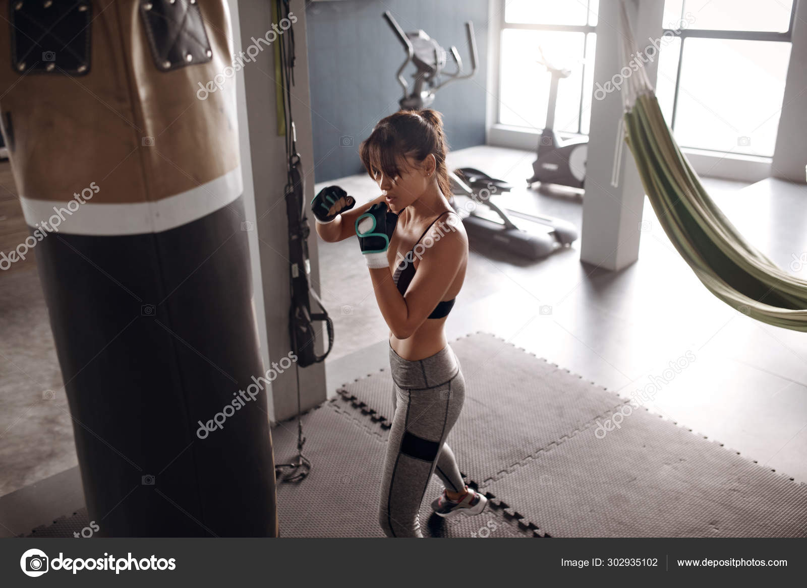 Sport. Female boxer doing boxing training workout at gym Stock Photo by ...
