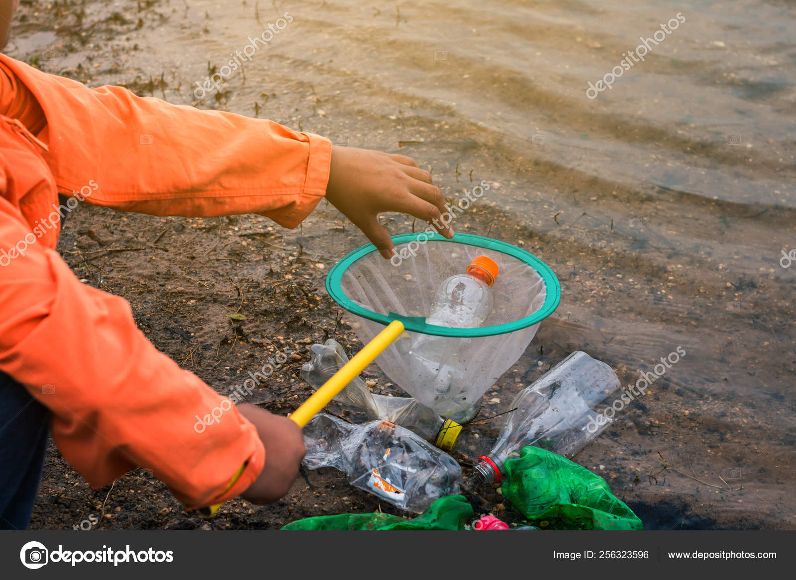 Group of kids volunteer help garbage collection charity environm ...