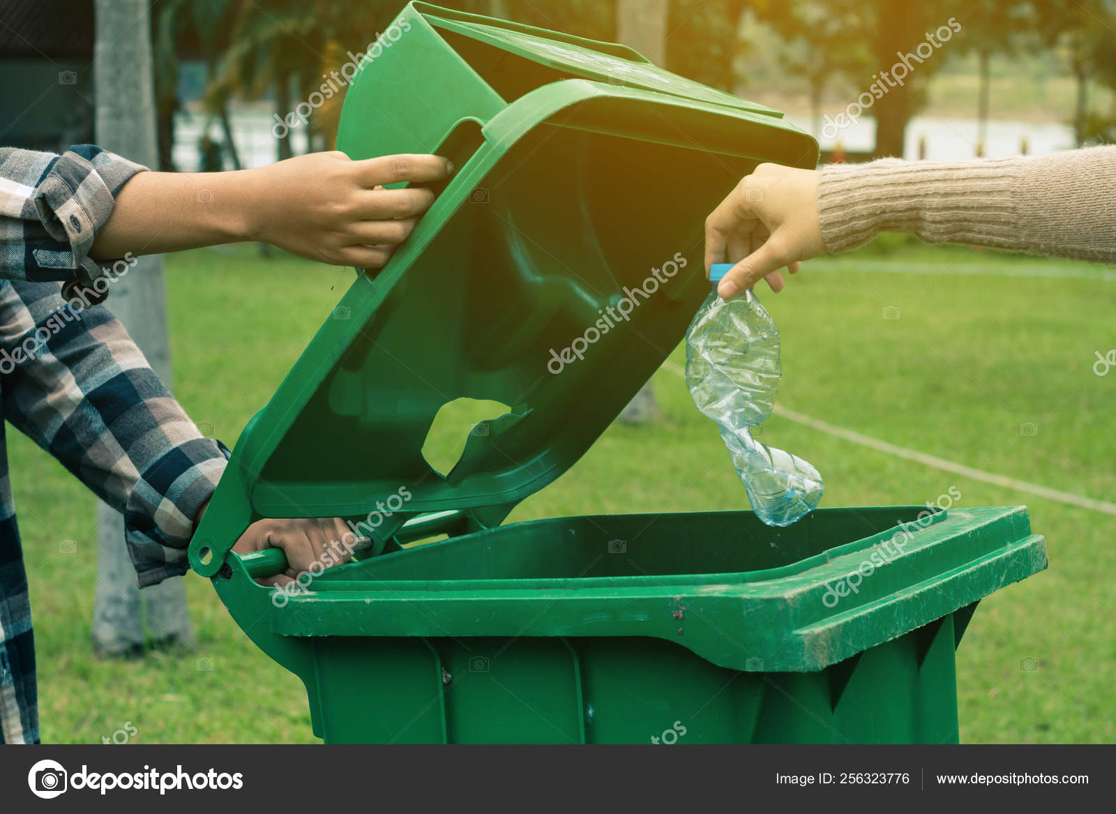 Group of kids volunteer help garbage collection charity environm ...