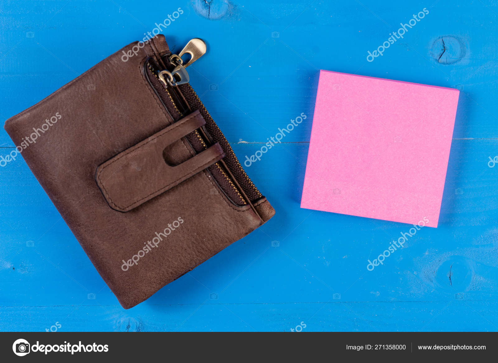 Front view leather coin purse wallet colored sticky notes pad wooden ...