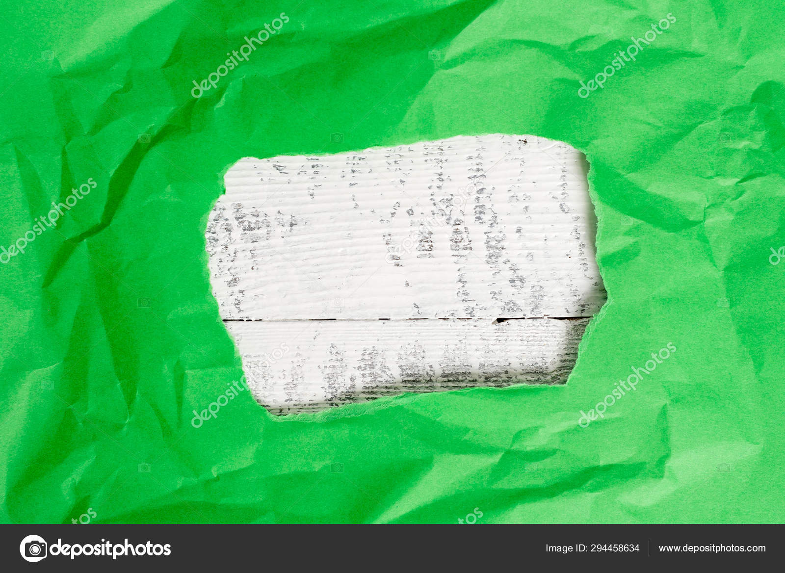 Green crumpled paper torn in the centre. Textured colored empty blank ...