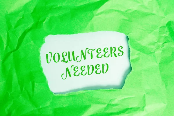 Text sign showing Volunteers Needed. Conceptual photo need work or help ...