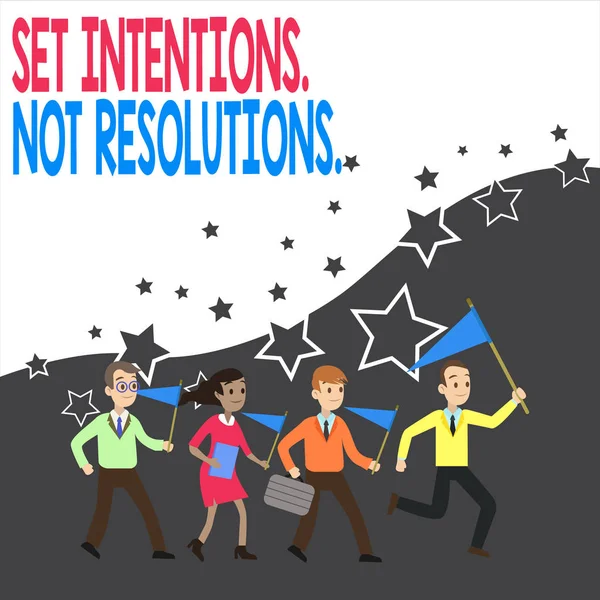 Conceptual hand writing showing Set Intentions Not Resolutions ...