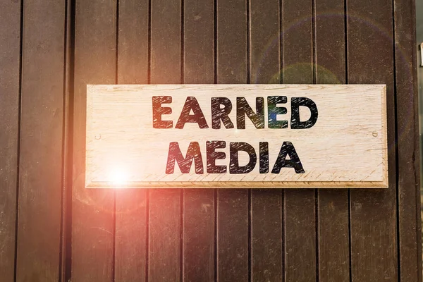 Writing note showing Earned Media. Business photo showcasing publicity ...