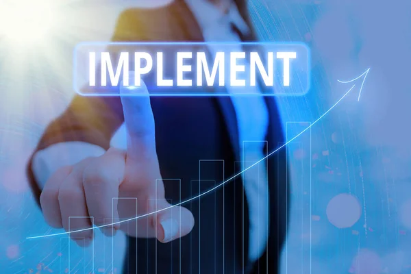 Signo de texto que muestra Implementar. Foto conceptual para ...