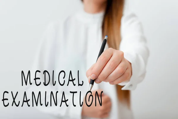 Handwriting text Medical Examination. Concept meaning the examination ...