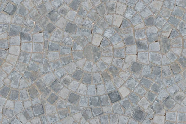 Cobble circular pattern block pavement texture. Top view Stock Photo by ...