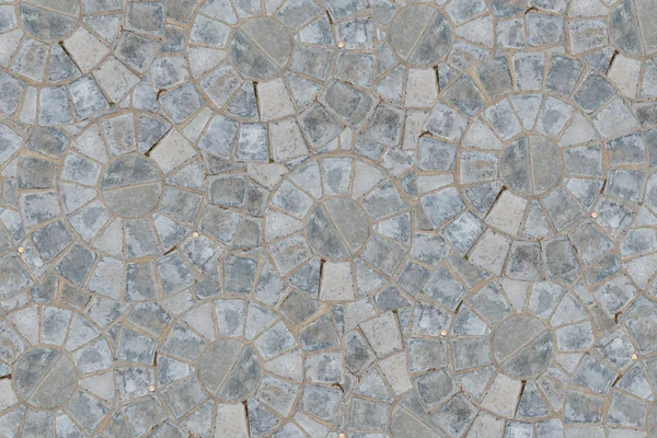Cobble circular pattern block pavement texture. Top view Stock Photo by ...