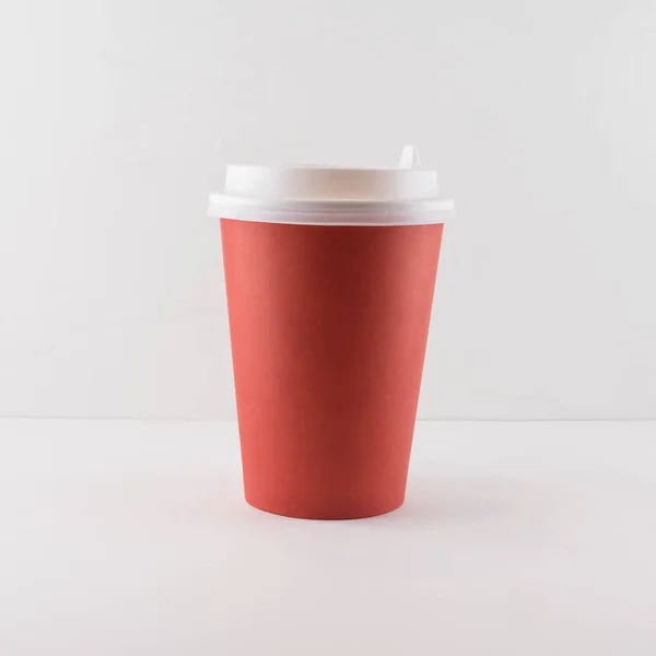 Red paper coffee Cup with you. Light background. - Stock Image - Everypixel