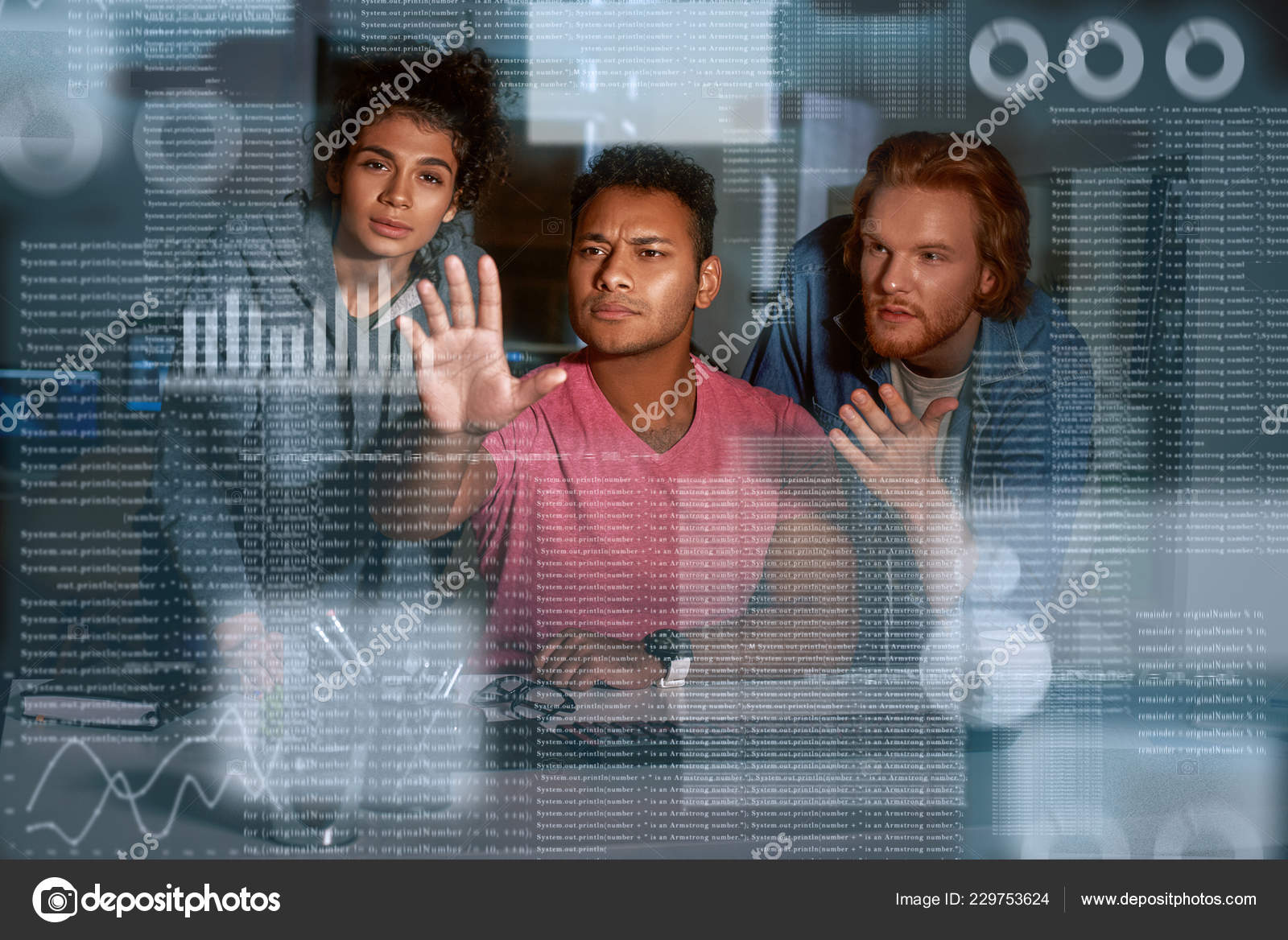 Young team of data analysts are looking over the data Stock Photo by ...