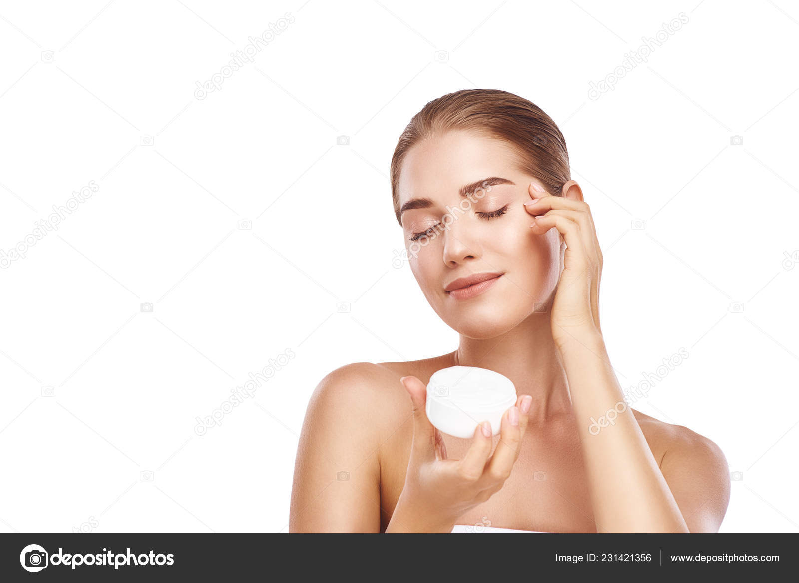 Beautiful womans face with facecream close-up studio on white. Stock ...