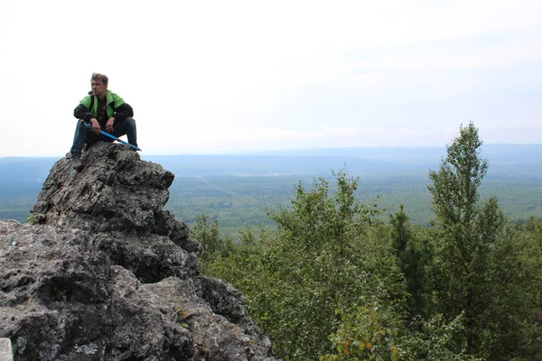 tourist on top of the mountain / beautiful landscape of the Ural ...