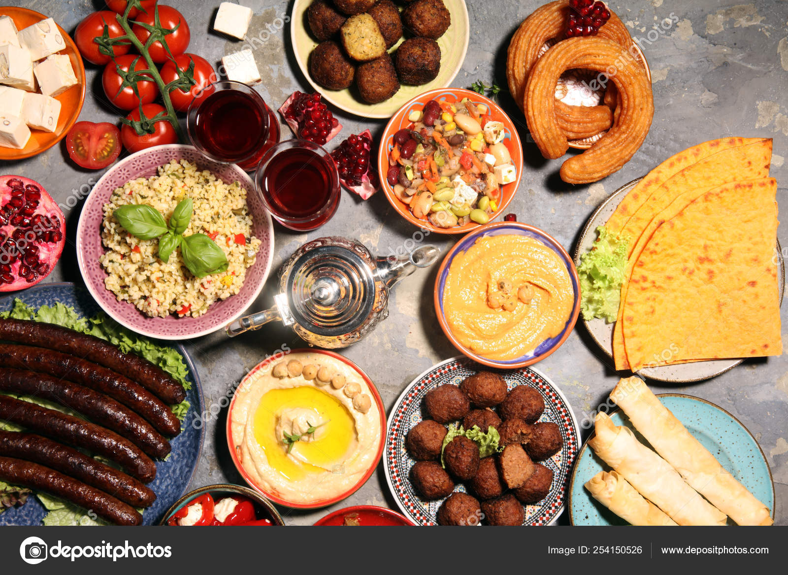Middle eastern or arabic dishes and assorted meze, concrete rust ...