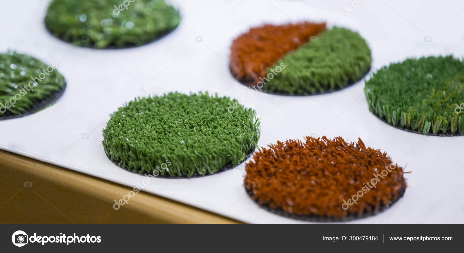 Green and red artificial turf rolled. Probes examples of artificial ...