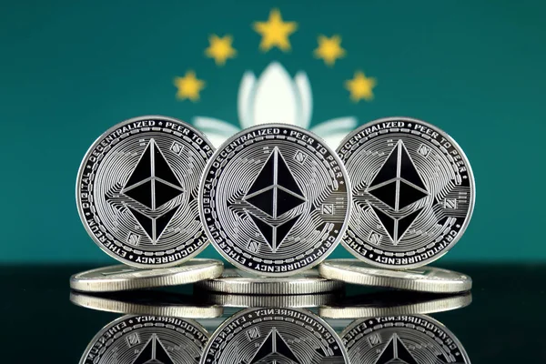 Physical version of Ethereum (ETH) and Macau Flag. Conceptual image for ...