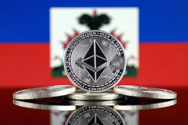Physical version of Ethereum (ETH) and Haiti Flag. Conceptual image for ...