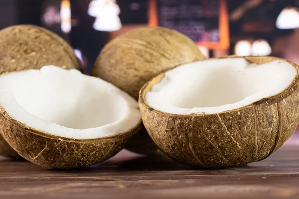 Fresh bio coconut with restaurant - Stock Image - Everypixel