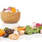 Chocolate stone candy isolated on white Stock Photo by ©PIXbank 306251274