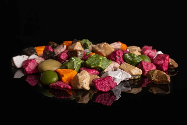 Chocolate stone candy isolated on white Stock Photo by ©PIXbank 306251274