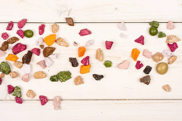 Chocolate stone candy isolated on white Stock Photo by ©PIXbank 306251274