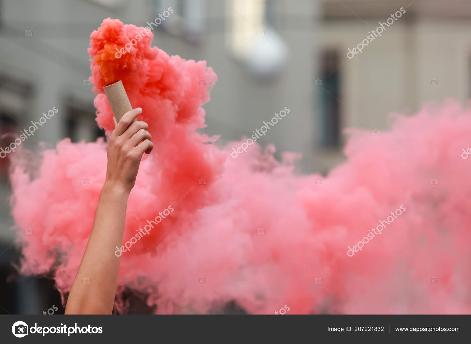 Man Holding Hand Flare Red Smoke Stock Photo by ©GoranJakus 207221832