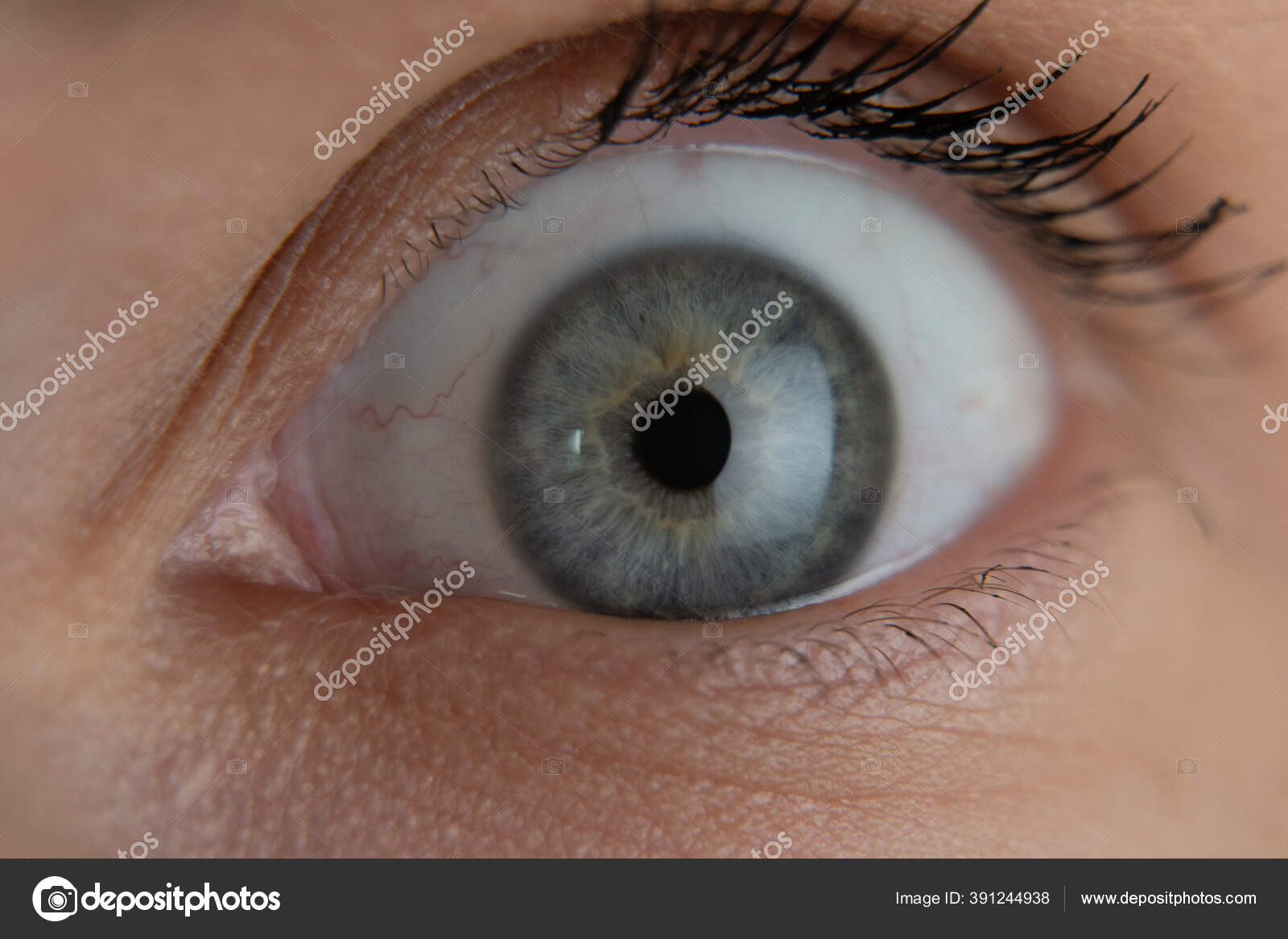 Close up beautiful blue eye opening human iris macro natural beauty ...