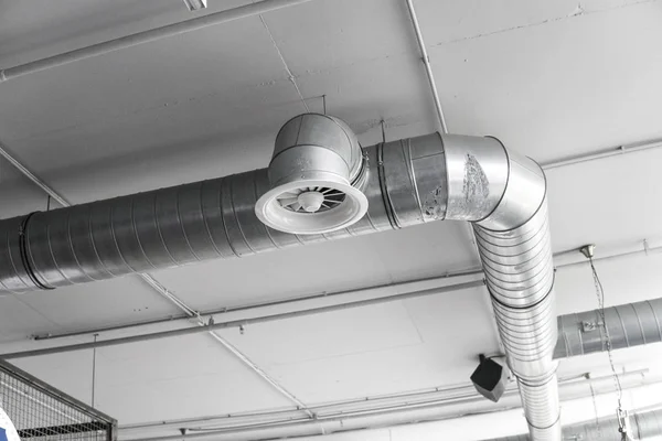 Ventilation system on the ceiling of large buildings. Ventilation pipes ...