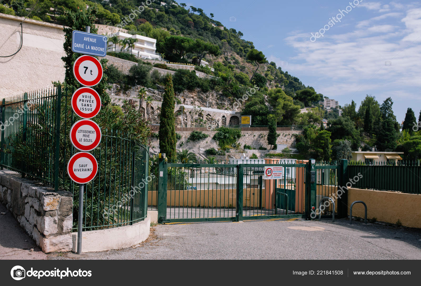 Road signs on the street of the southern European city Stock Photo by ...