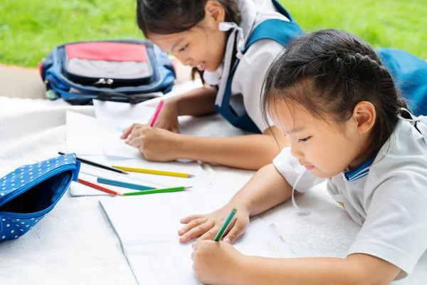 School children writing Stock Photos, Royalty Free School children ...