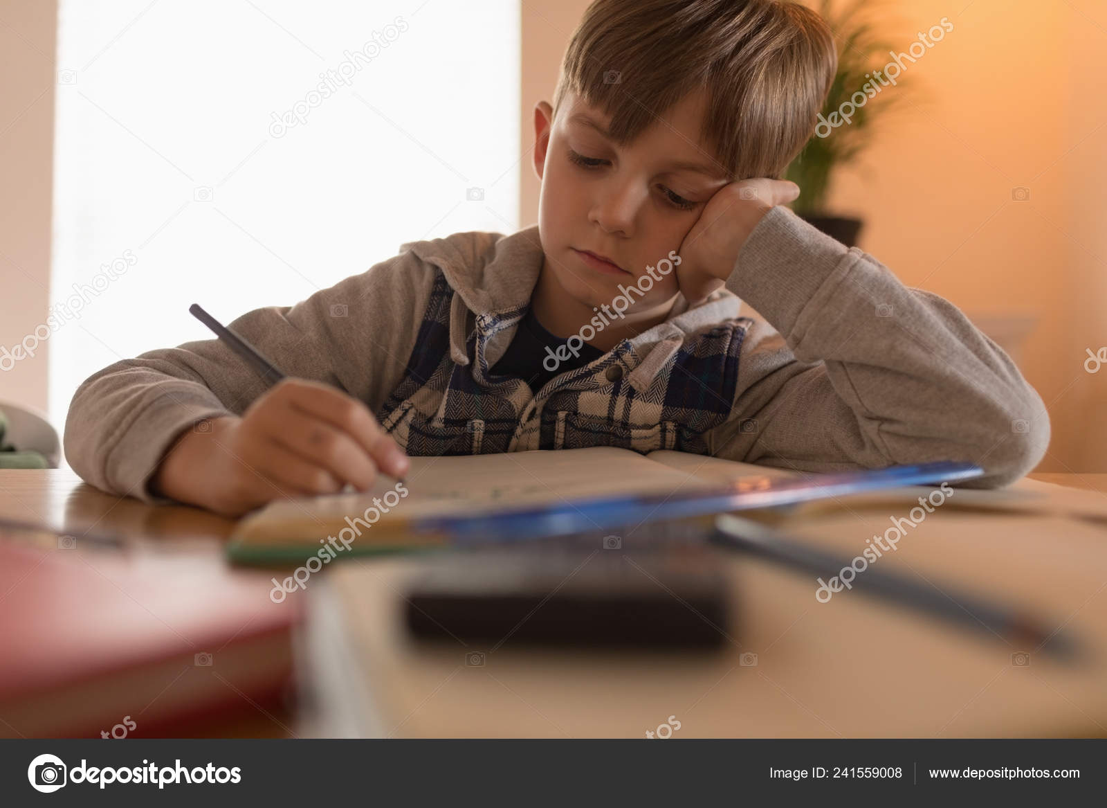 Front View Young Innocent Boy Concentrating While Doing His Math Stock ...