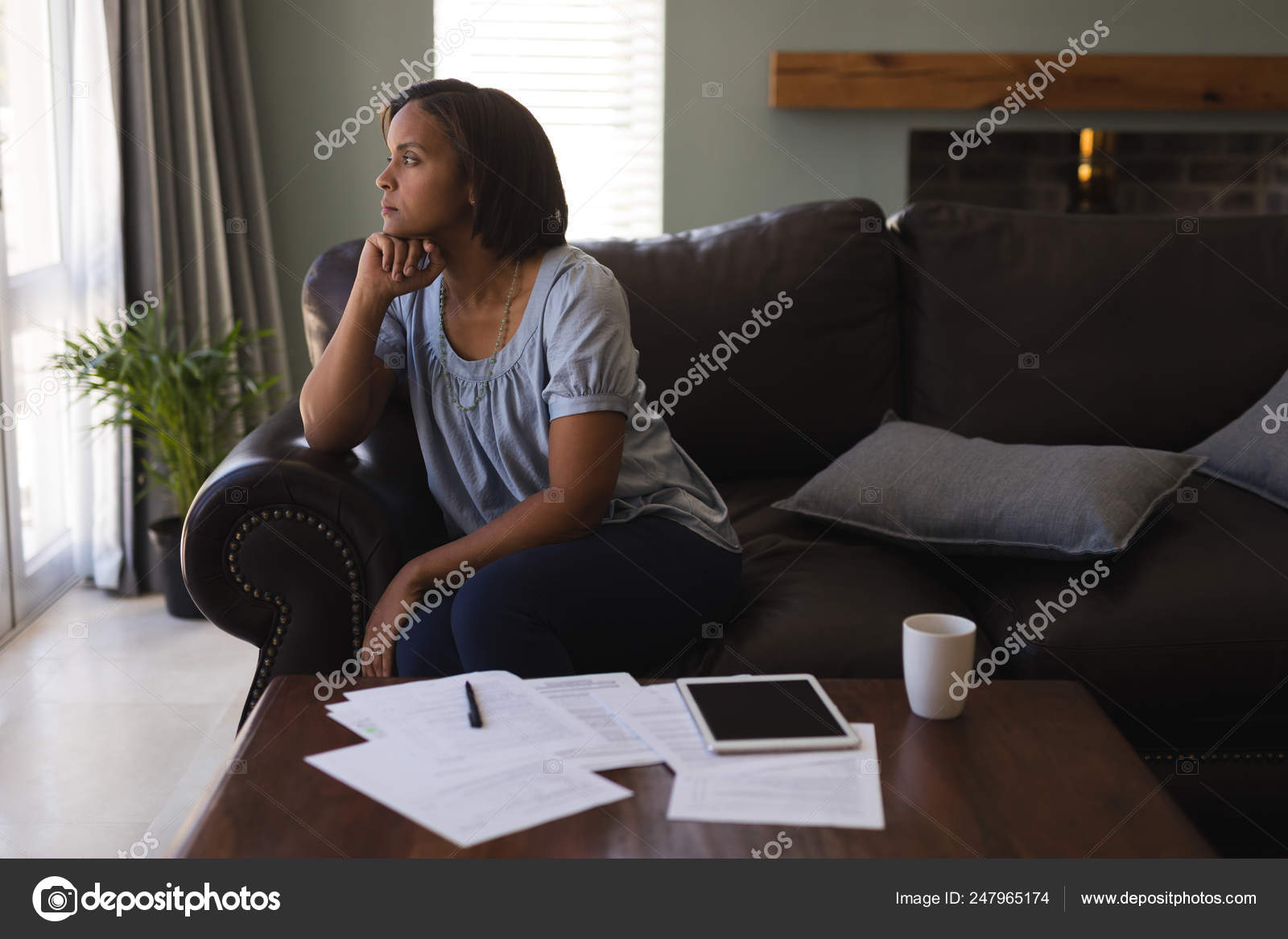 Front View Thoughtful Woman Sitting Sofa Living Room Home Stock Photo ...