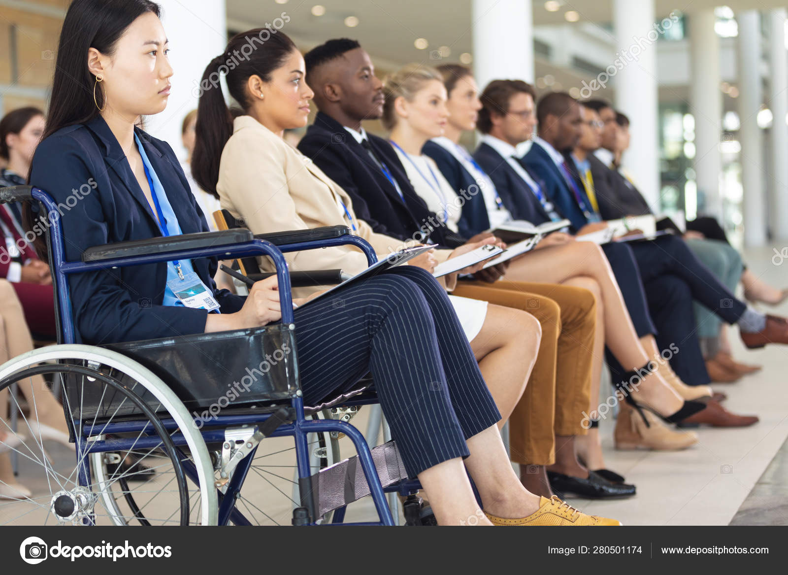 People Sitting On Chairs Side View