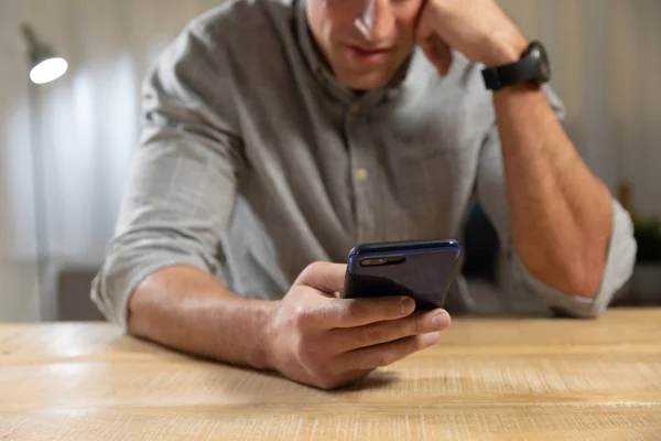 Front View Close Young Caucasian Man Sitting Table Using Tablet Stock ...