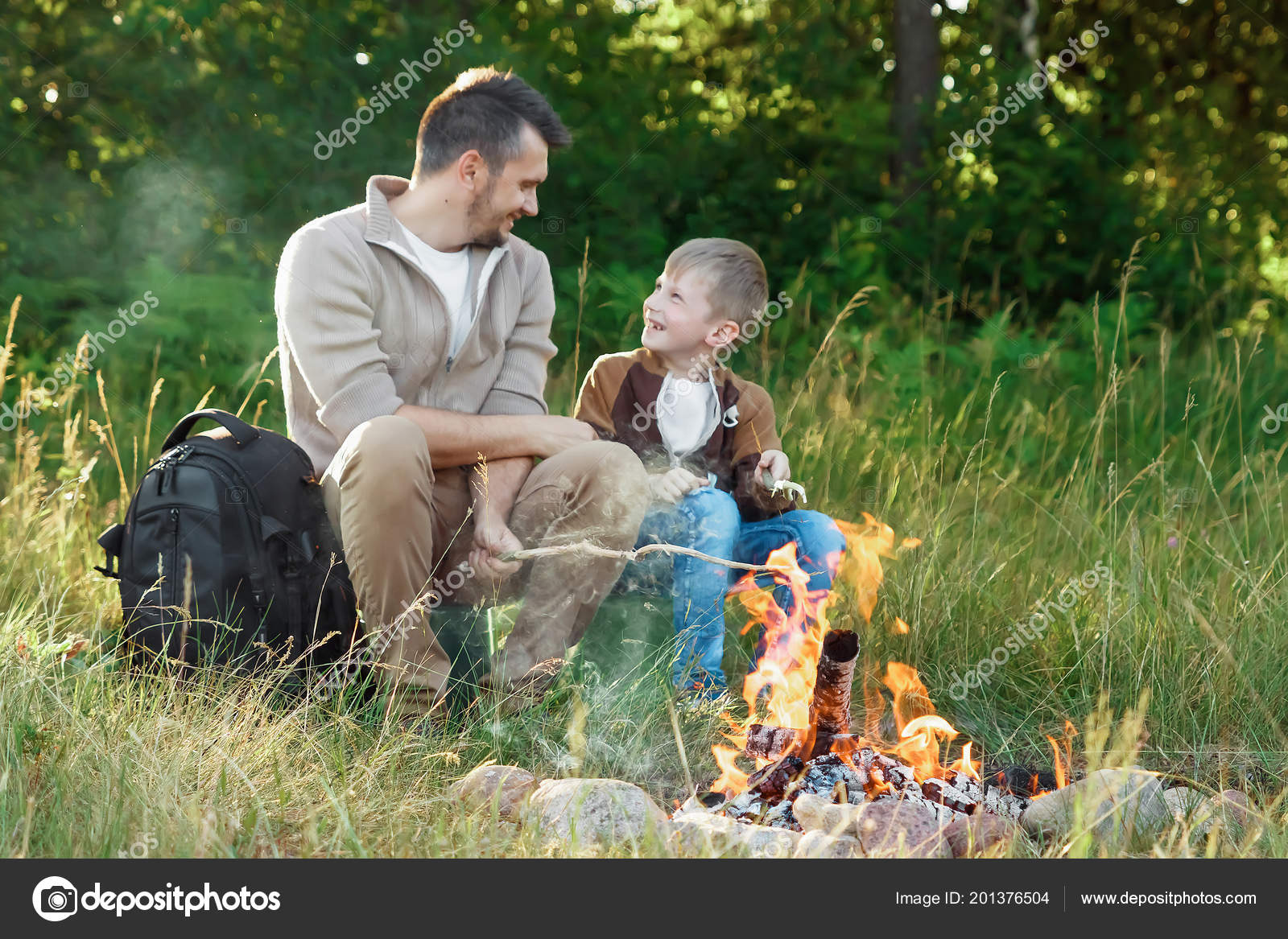 Father Son Fire Background Green Nature Hike Time Family Family Stock ...