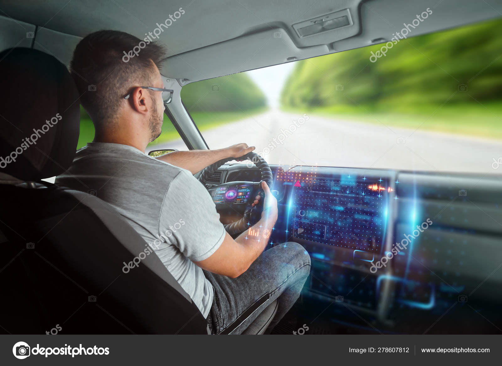 A man in an autonomous car. Self-driving. Concept autopilot, automotive ...