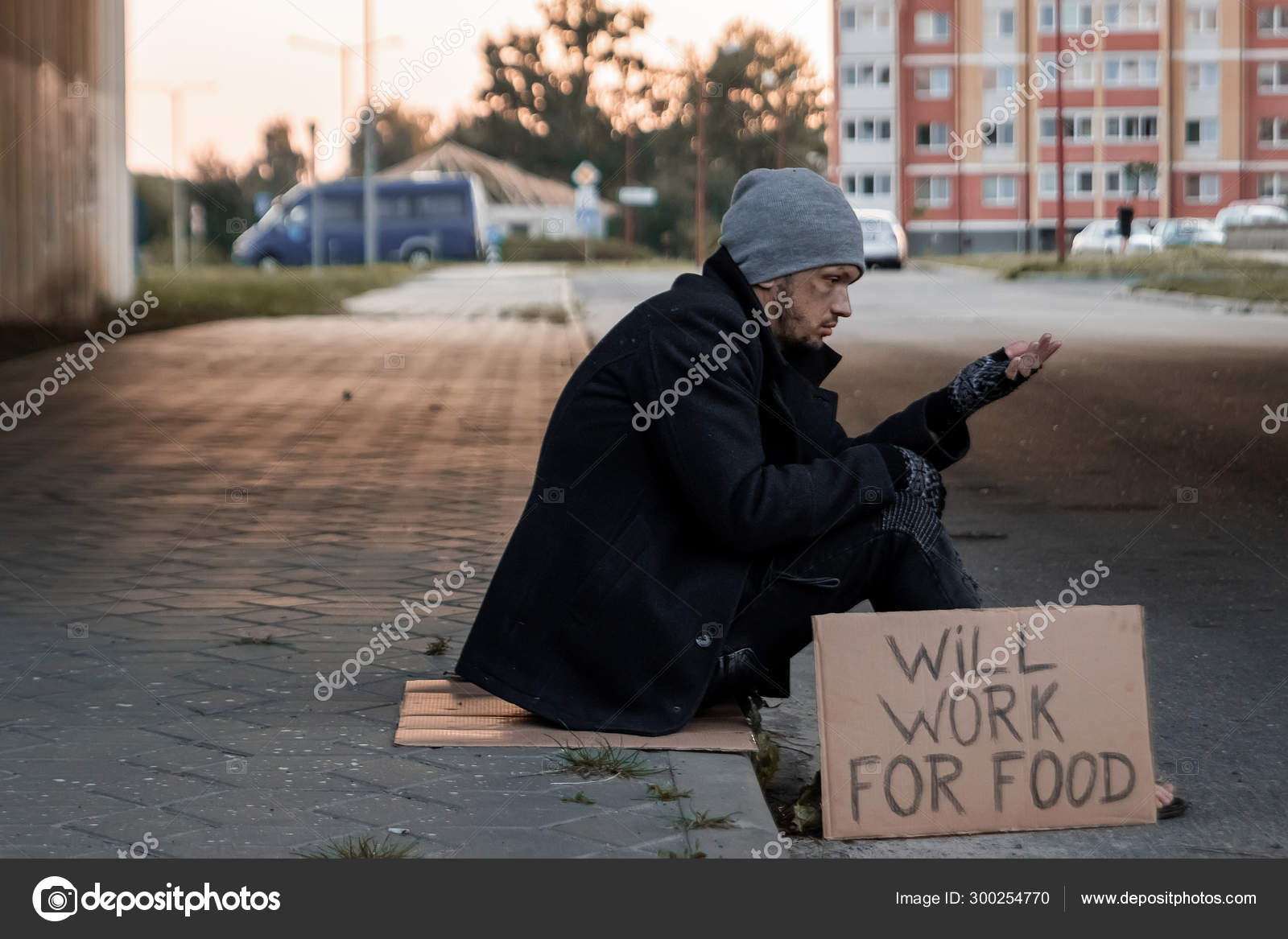 Homeless Person With Sign