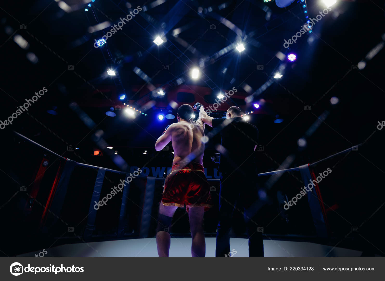 Fighter stands in the ring before the fight — Stock Photo © ParStud ...