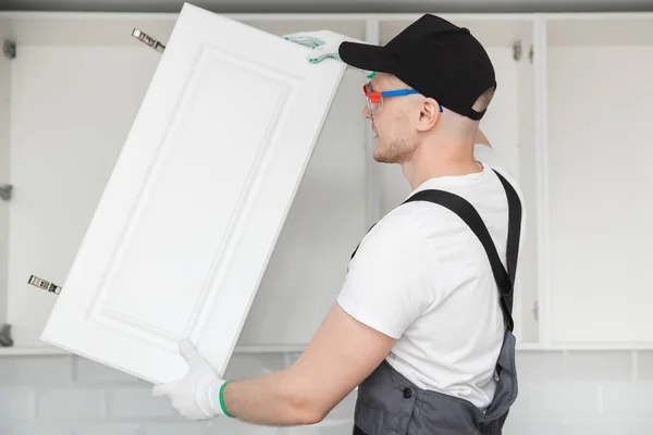 Kitchen installation Stock Photos, Royalty Free Kitchen installation ...