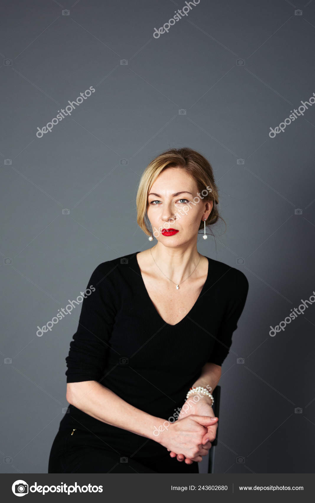 Portrait Beautiful Woman Black Dress Grey Background Stock Photo by ©phaustov 243602680