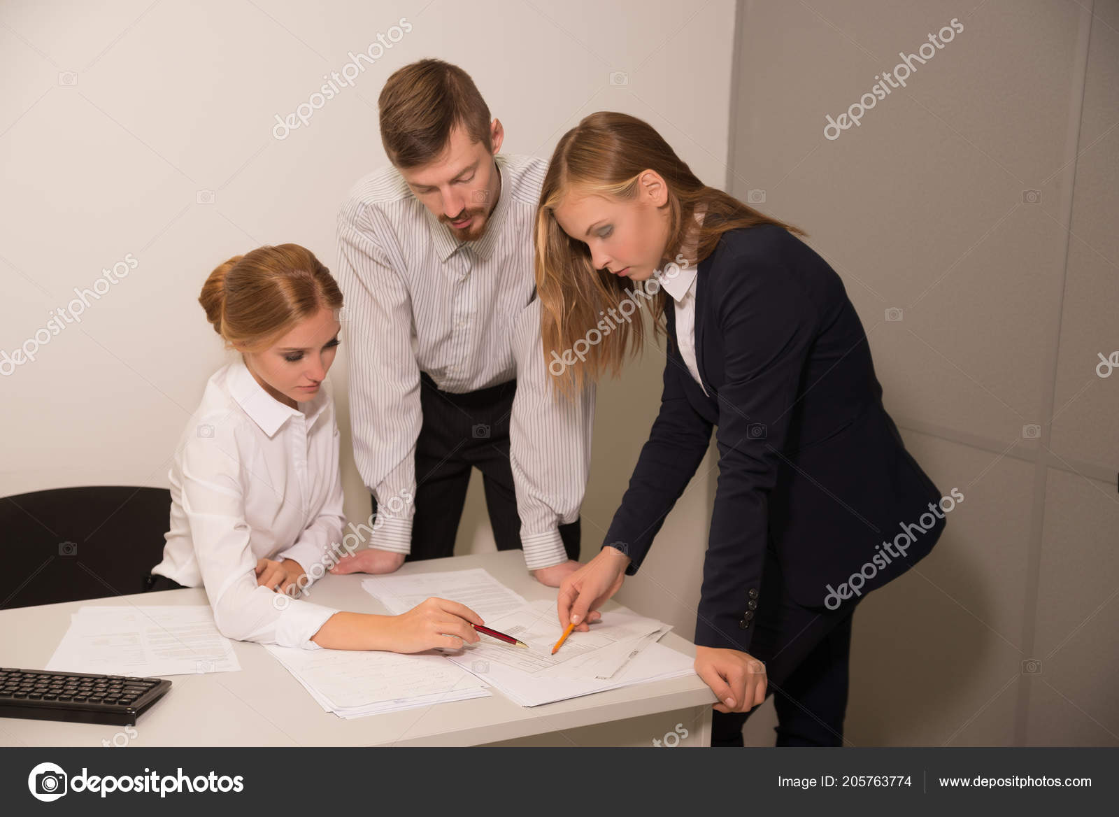 3 people work in the office — Stock Photo © BagginsES #205763774