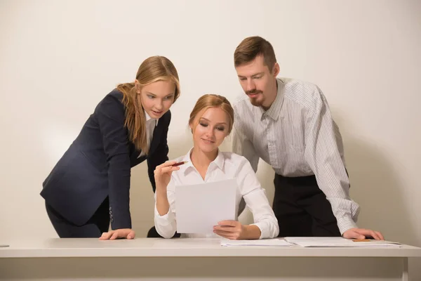 3 people work in the office — Stock Photo © BagginsES #205763774