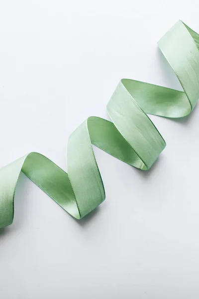 light green ribbon decoration on white background - Stock Image ...