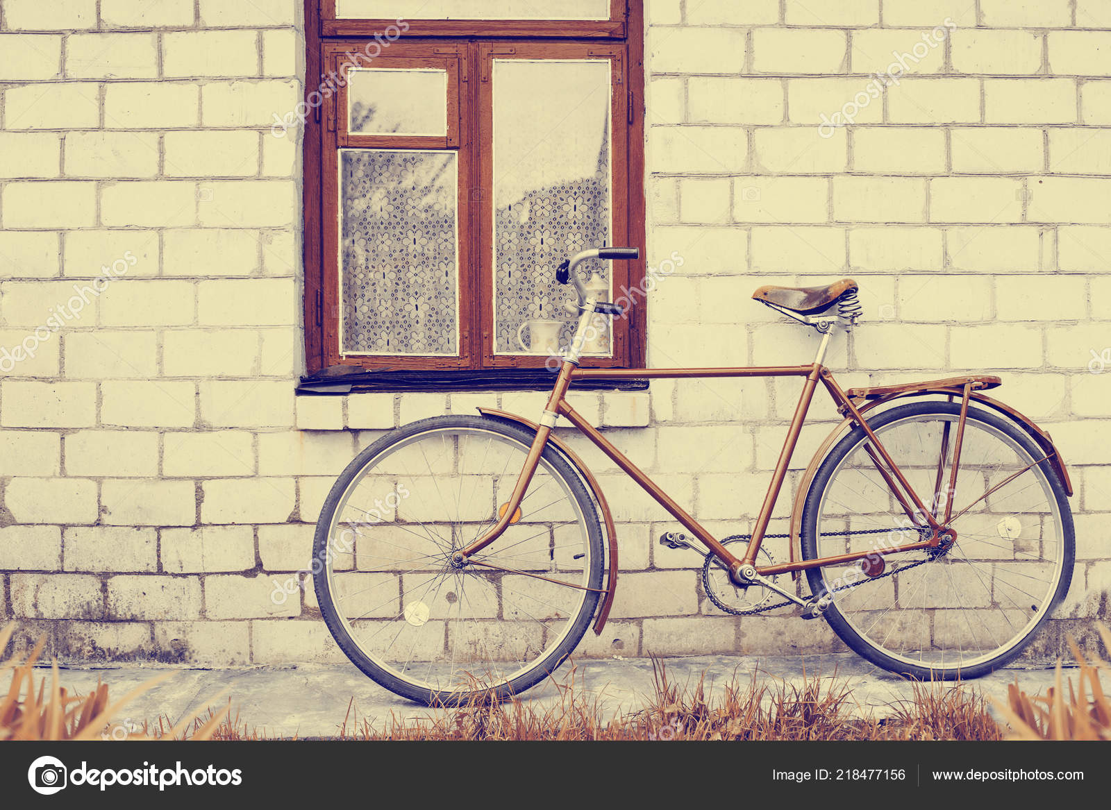 Vintage Bicycle Standing Window Wall Stock Photo by ©avgustin 218477156