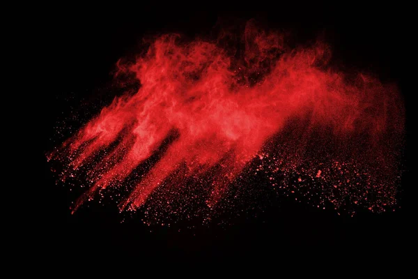 abstract red powder explosion on black background.abstract red powder ...