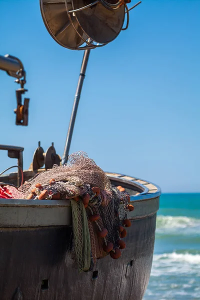 A view of a fishing net inside of the boat in the sea. Beautiful calm ...