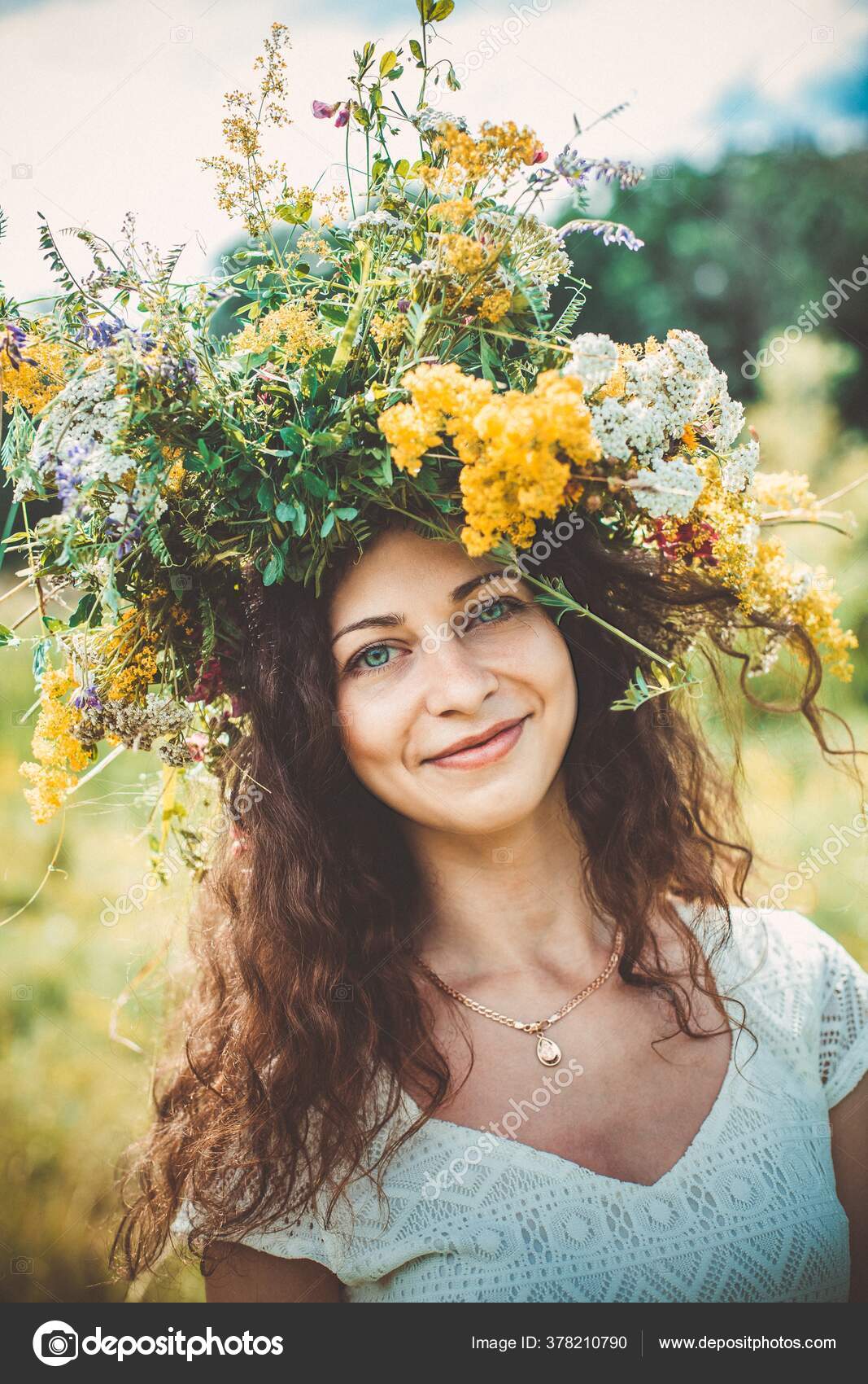 Girl in a wreath of wildflowers at the festival Midsummer — Stock Photo ...