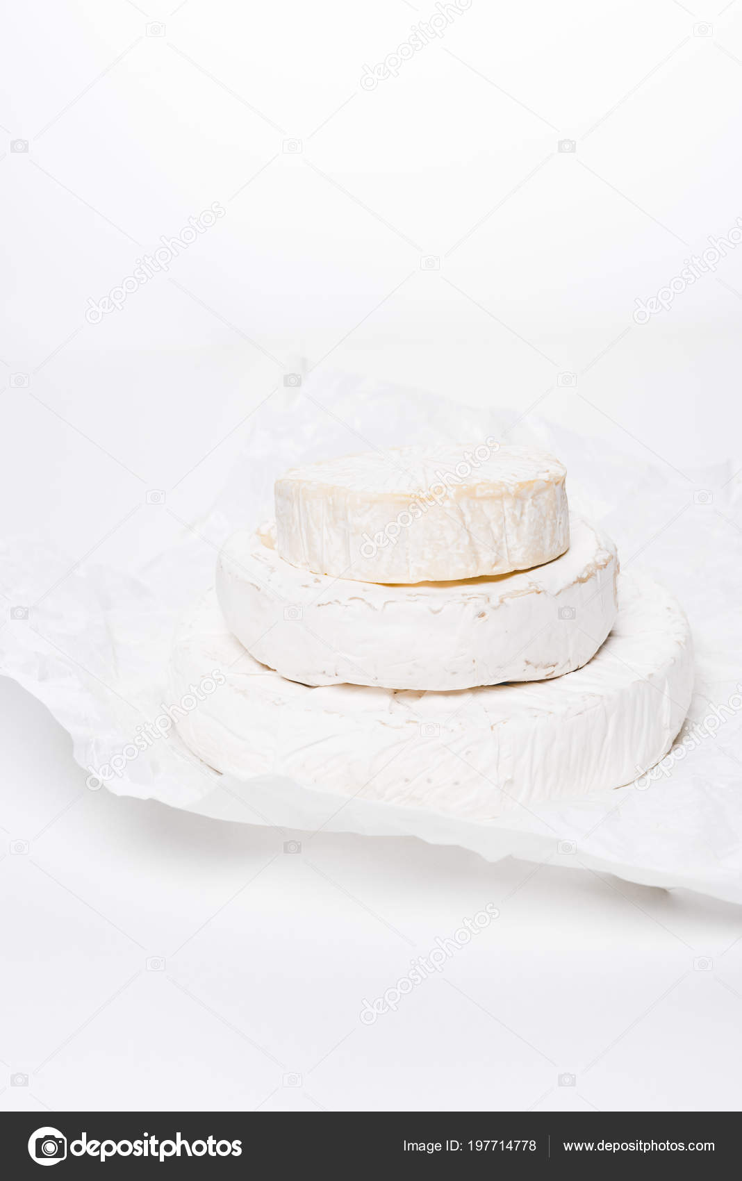 Stack Tasty Brie Cheese Heads Crumpled Paper White Surface — Stock ...