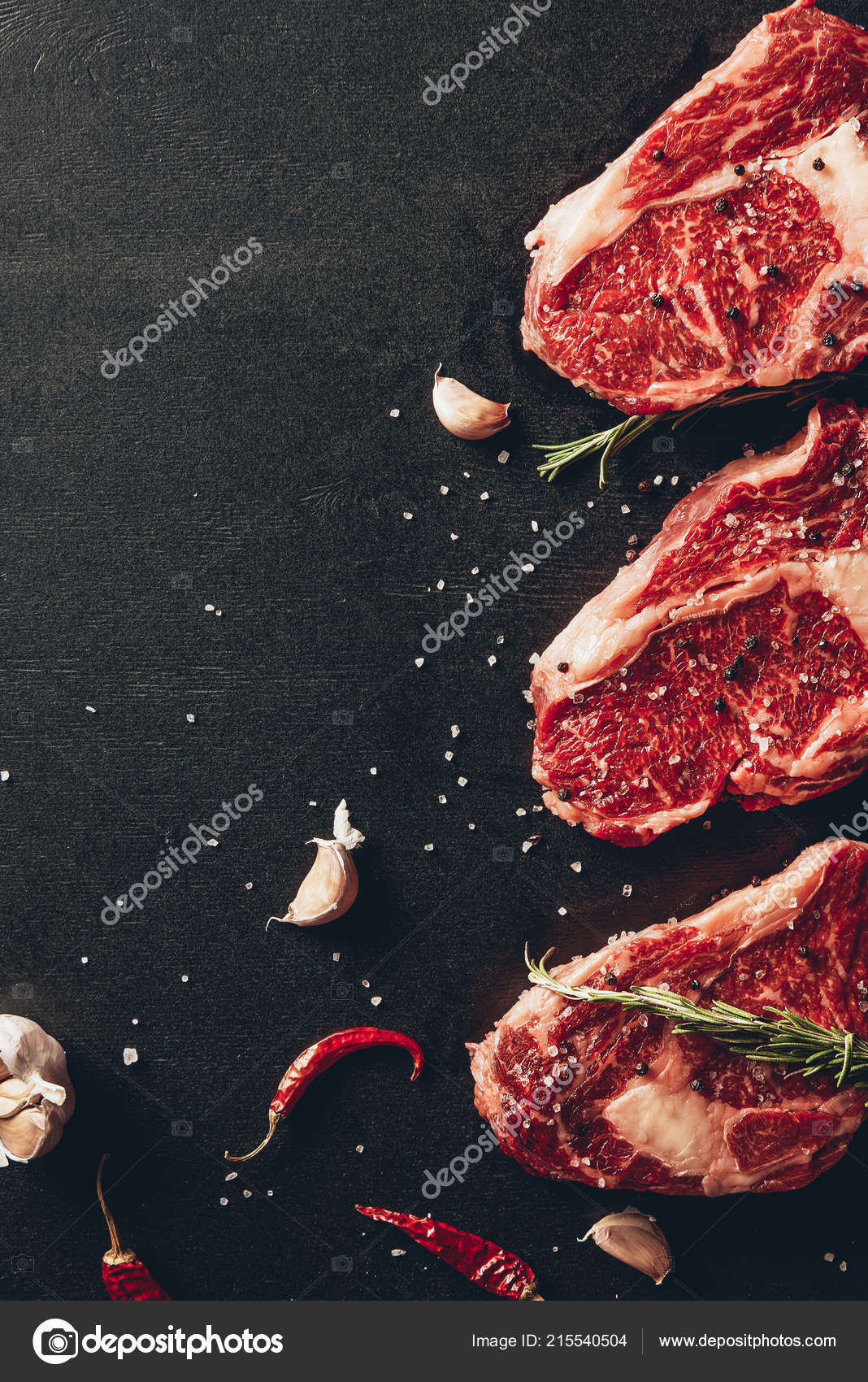 Top View Raw Meat Steaks Garlic Chili Peppers Tabletop Kitchen Stock ...