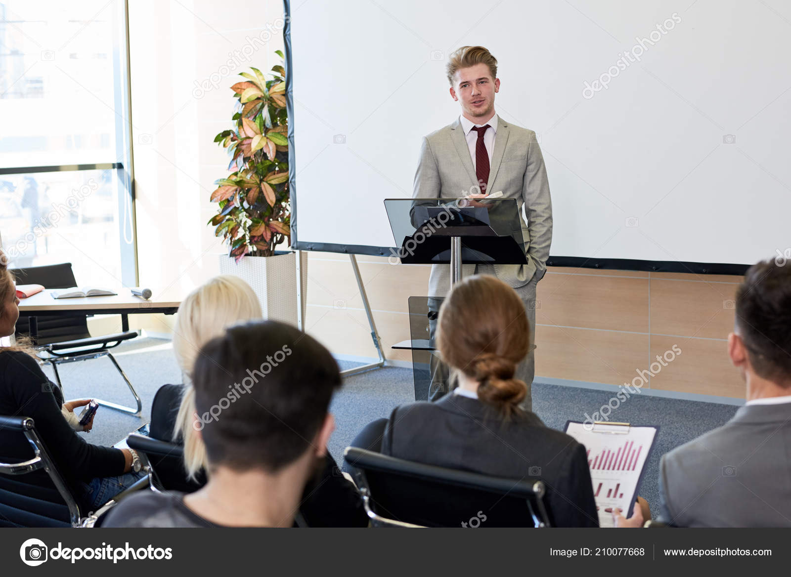 Portrait Young Businessman Standing Podium While Giving Speech ...